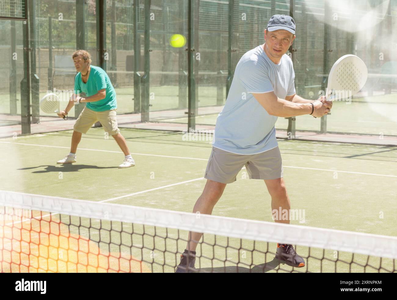 Two men playing doubles hi-res stock photography and images - Alamy