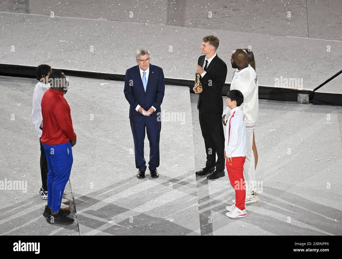 Mijain Lopez Nunez of Cuba, Eliud Kipchoge of Kenya, Djankeu Ngamba of Refugee Olympic Team ...