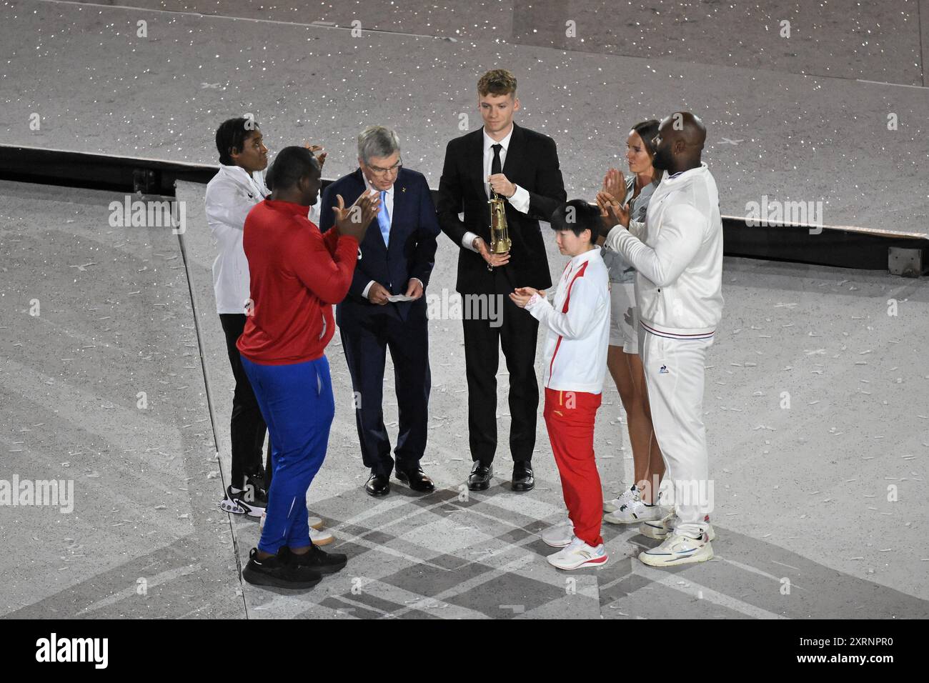 Mijain Lopez Nunez of Cuba, Eliud Kipchoge of Kenya, Djankeu Ngamba of Refugee Olympic Team ...