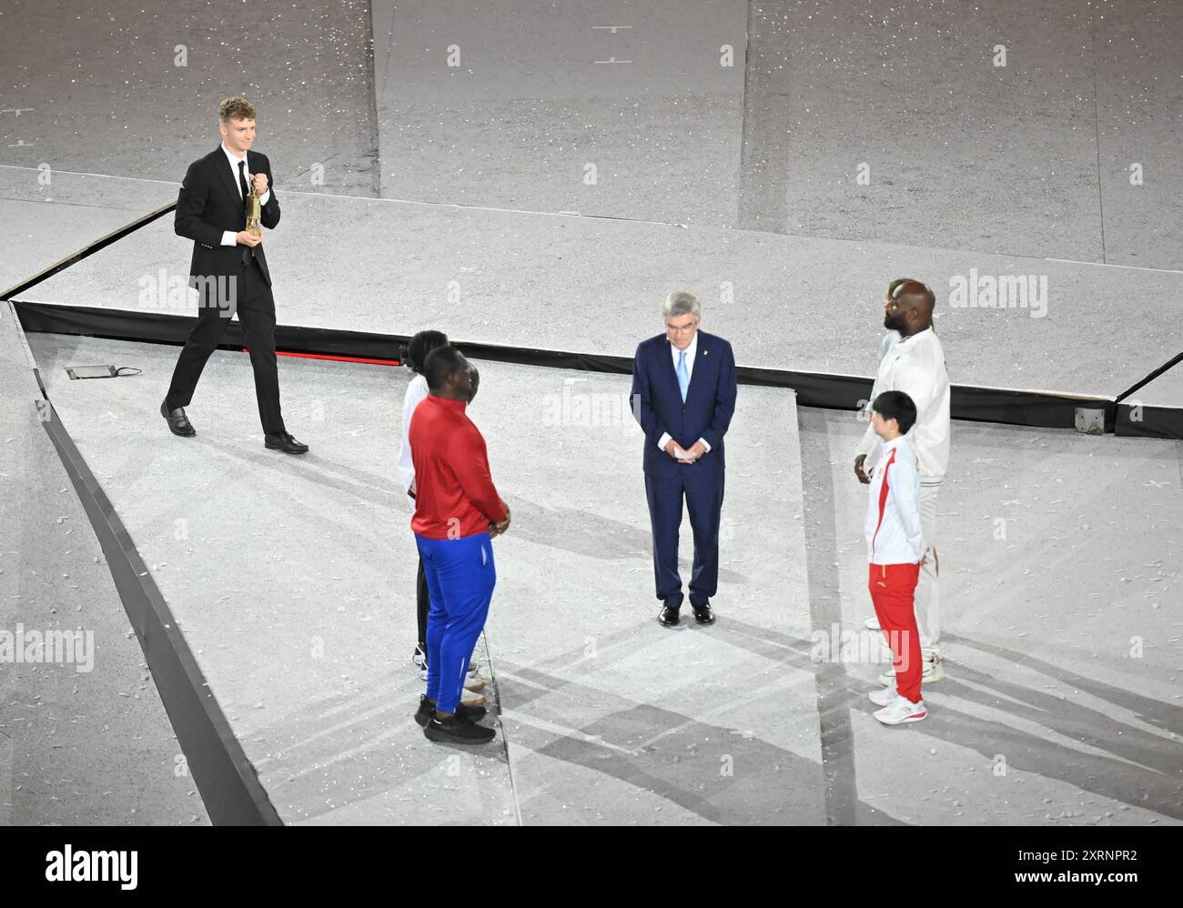 Mijain Lopez Nunez of Cuba, Eliud Kipchoge of Kenya, Djankeu Ngamba of Refugee Olympic Team ...