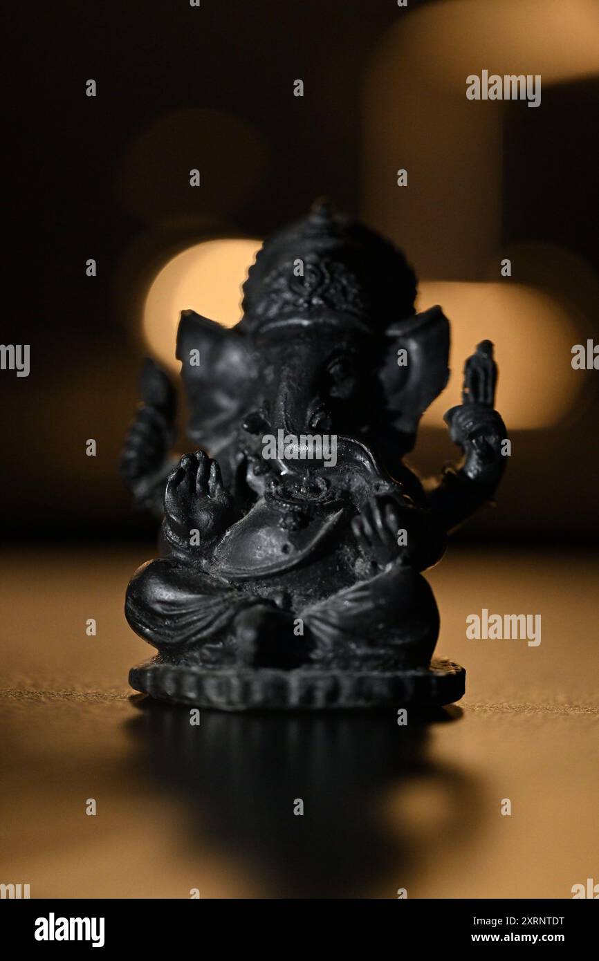 Black Ganesha Statue - Elephant headed god Stock Photo - Alamy