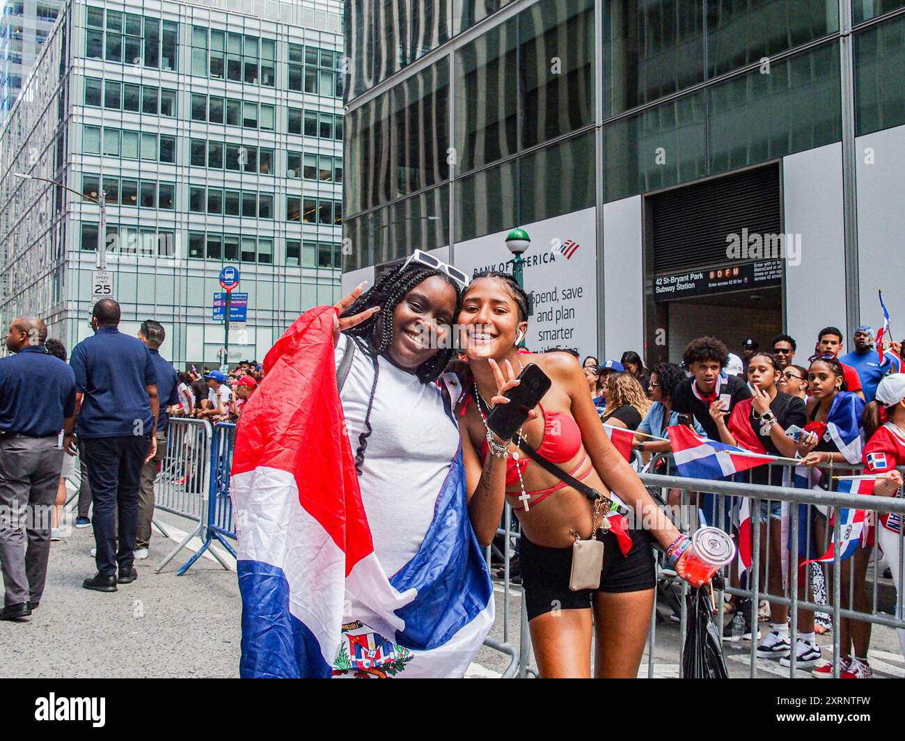 New York, New York, USA. 11th Aug, 2024. Two young Dominican women pose ...