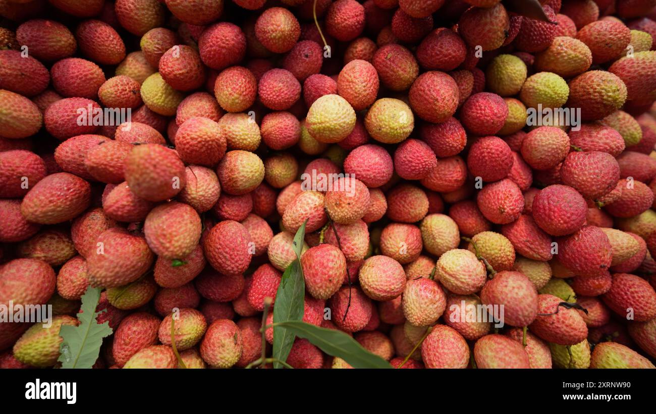 Ripe lychees, ready for sale at the market. Vibrant colors and juicy ...