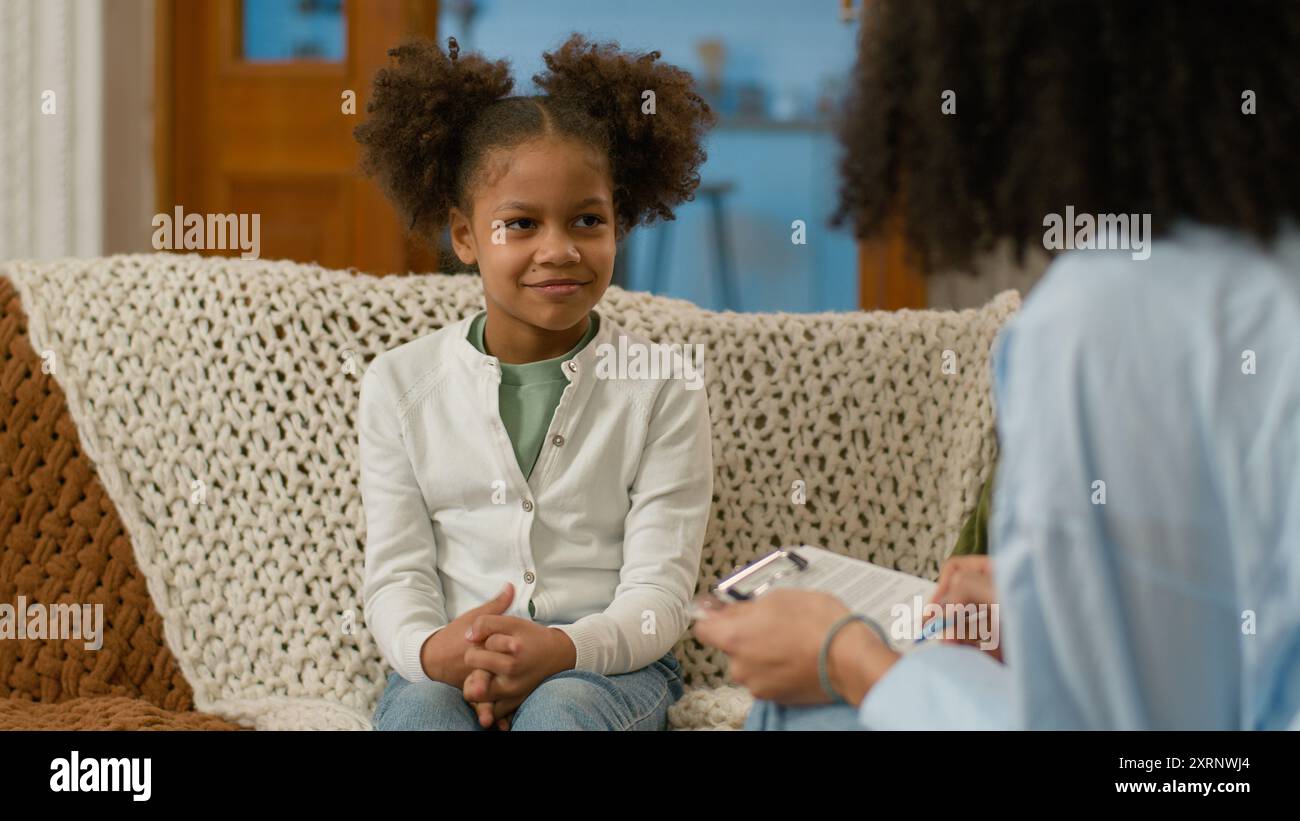 African American happy child tell doctor talk explain consent yes smile ...
