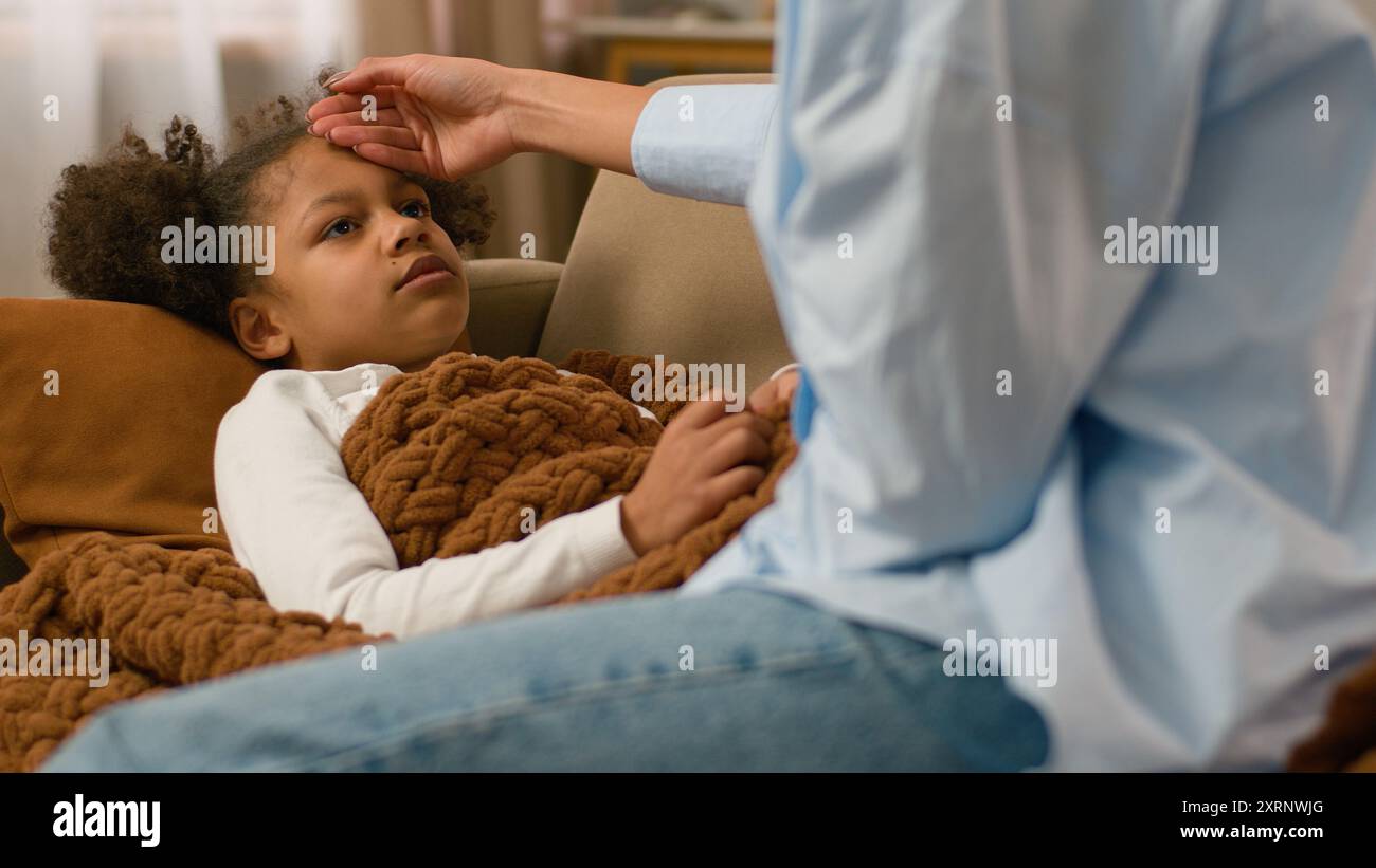 African American child coughing sore throat virus mother touching ...
