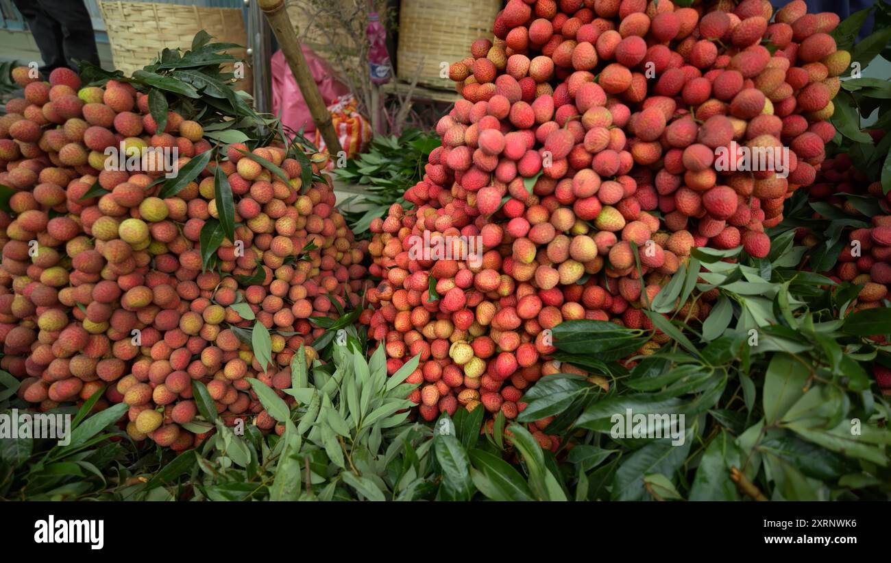 Ripe lychees, ready for sale at the market. Vibrant colors and juicy ...