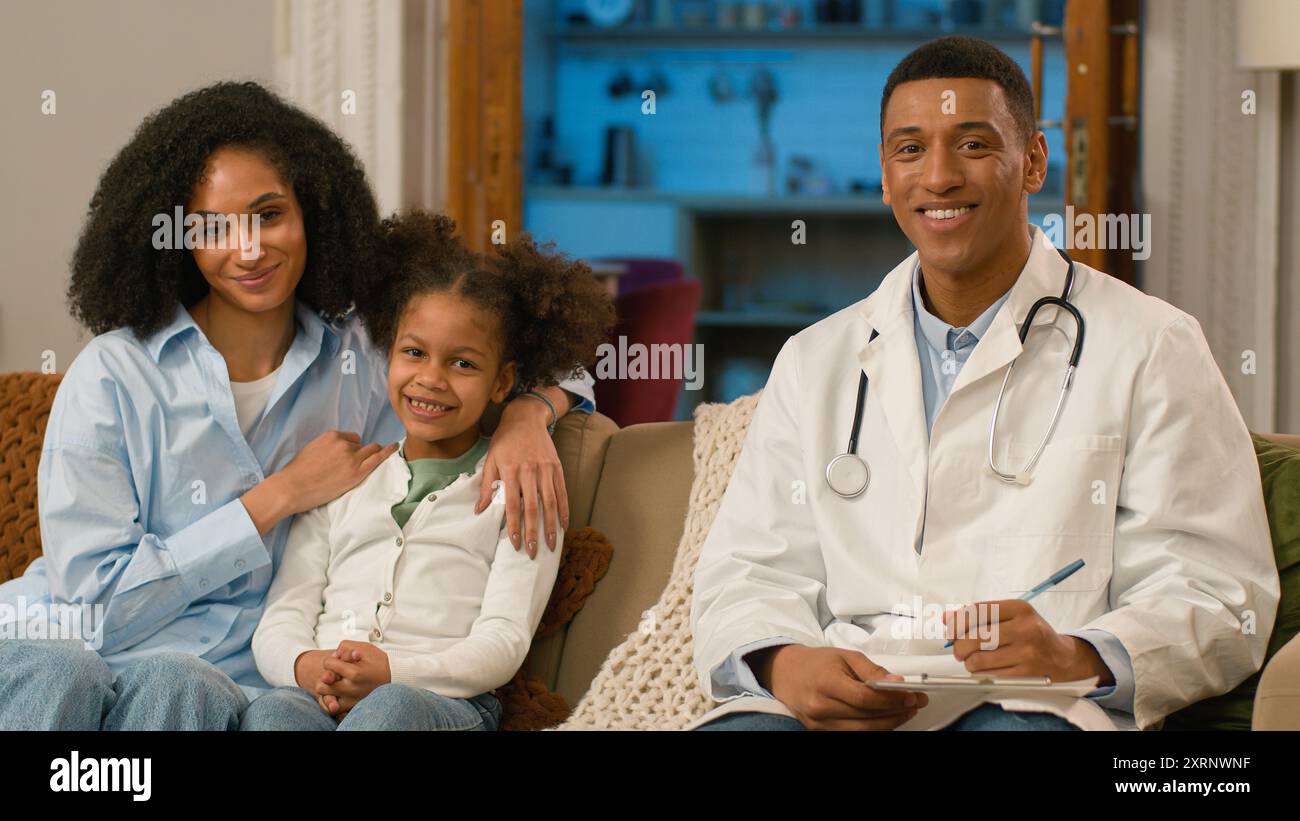 Happy African American mother daughter doctor woman man girl smiling ...