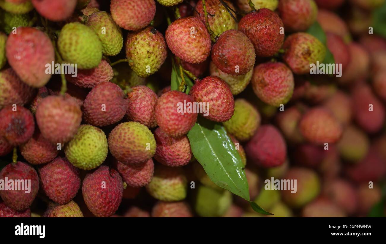 Ripe lychees, ready for sale at the market. Vibrant colors and juicy ...