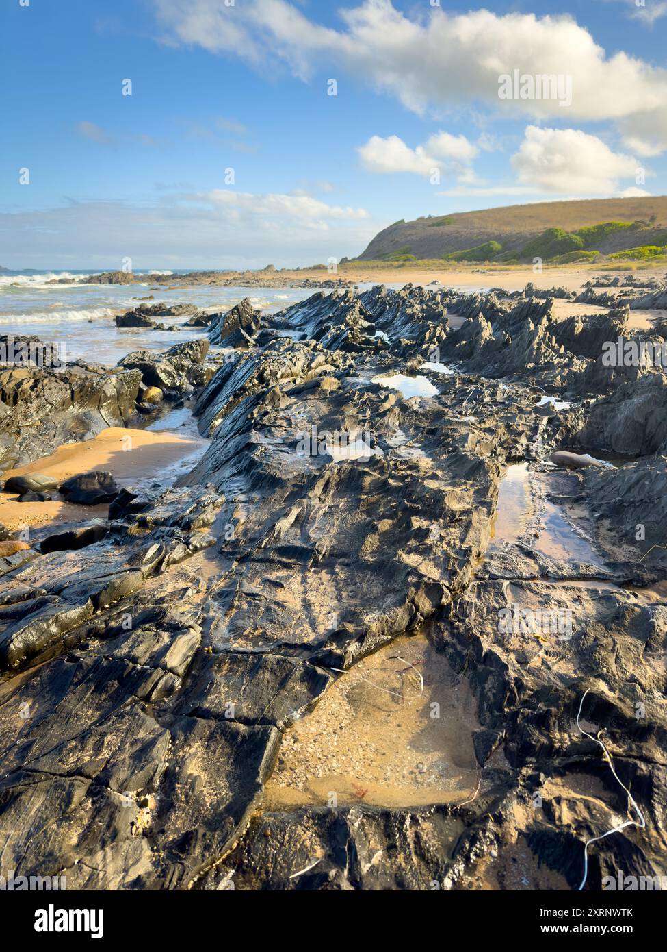 Landscape views of rocks and ocean from beaches along the Victor Harbor ...