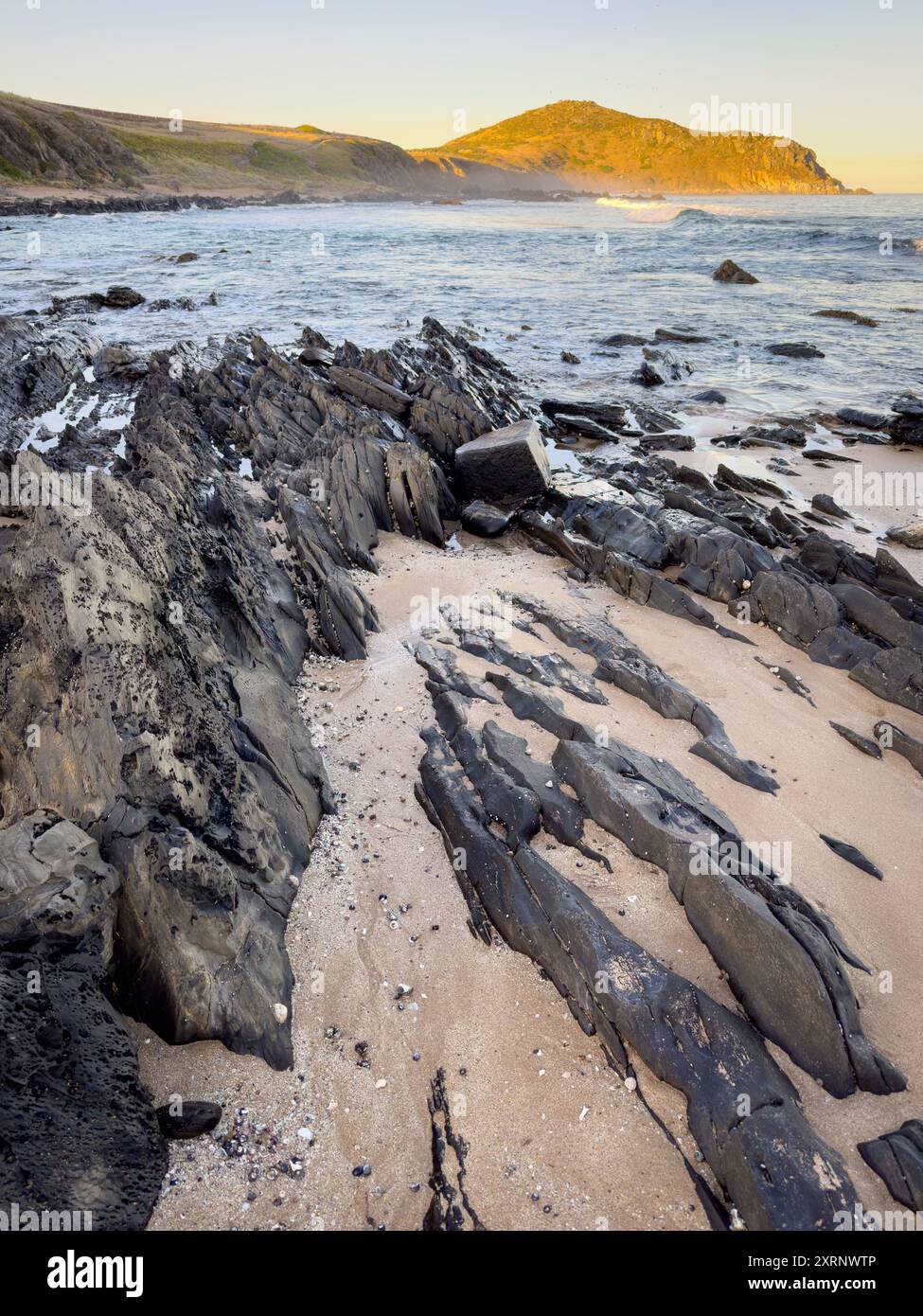 Landscape views of rocks and ocean from beaches along the Victor Harbor ...