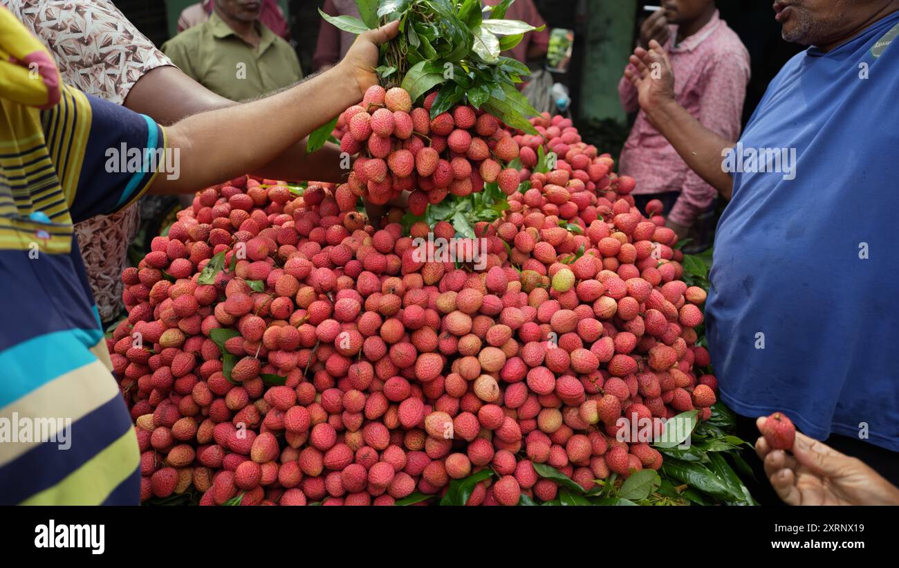 Ripe lychees, ready for sale at the market. Vibrant colors and juicy ...