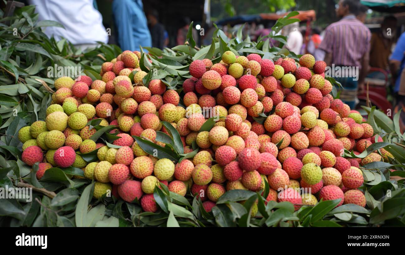 Ripe lychees, ready for sale at the market. Vibrant colors and juicy ...