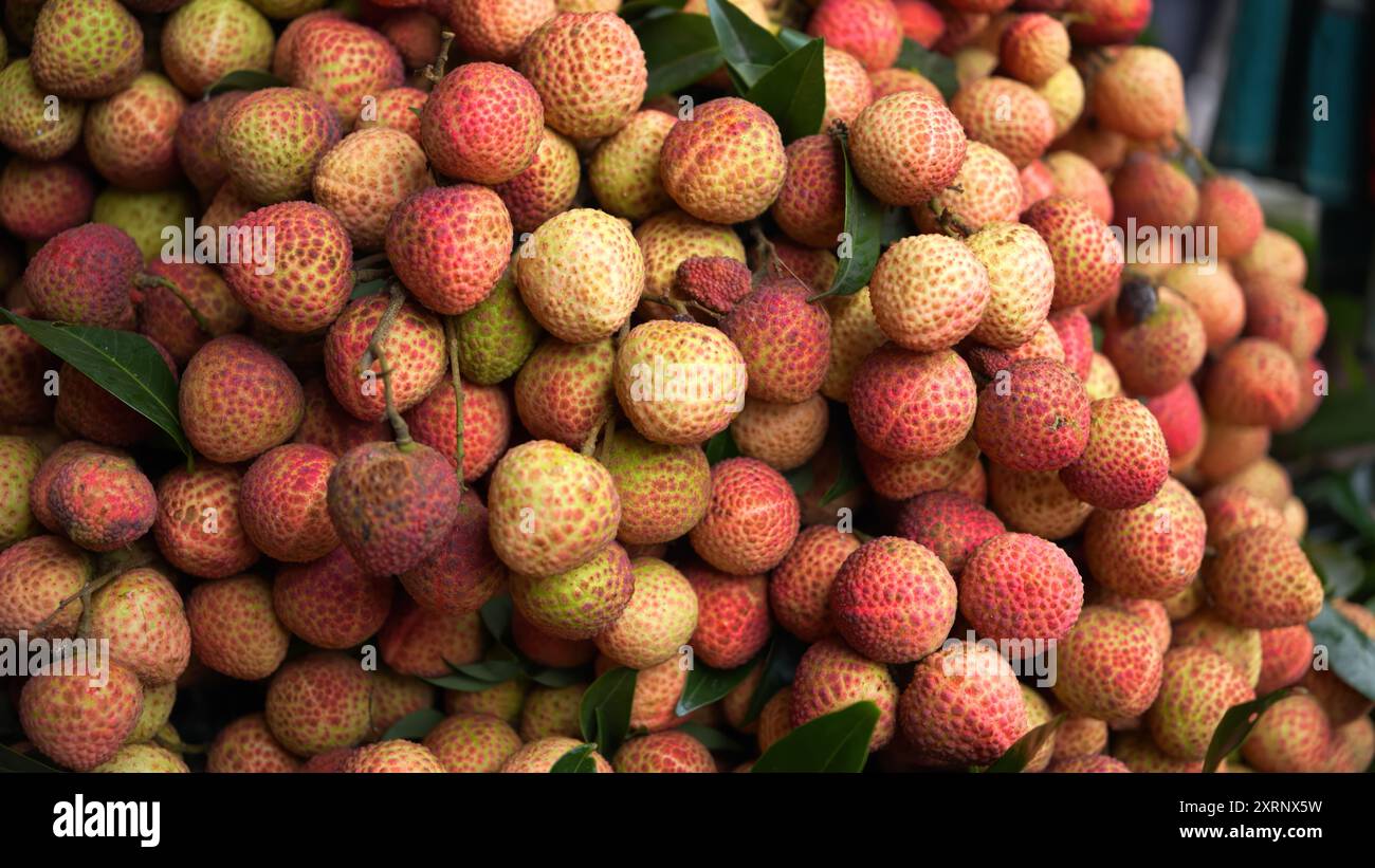 Ripe lychees, ready for sale at the market. Vibrant colors and juicy ...