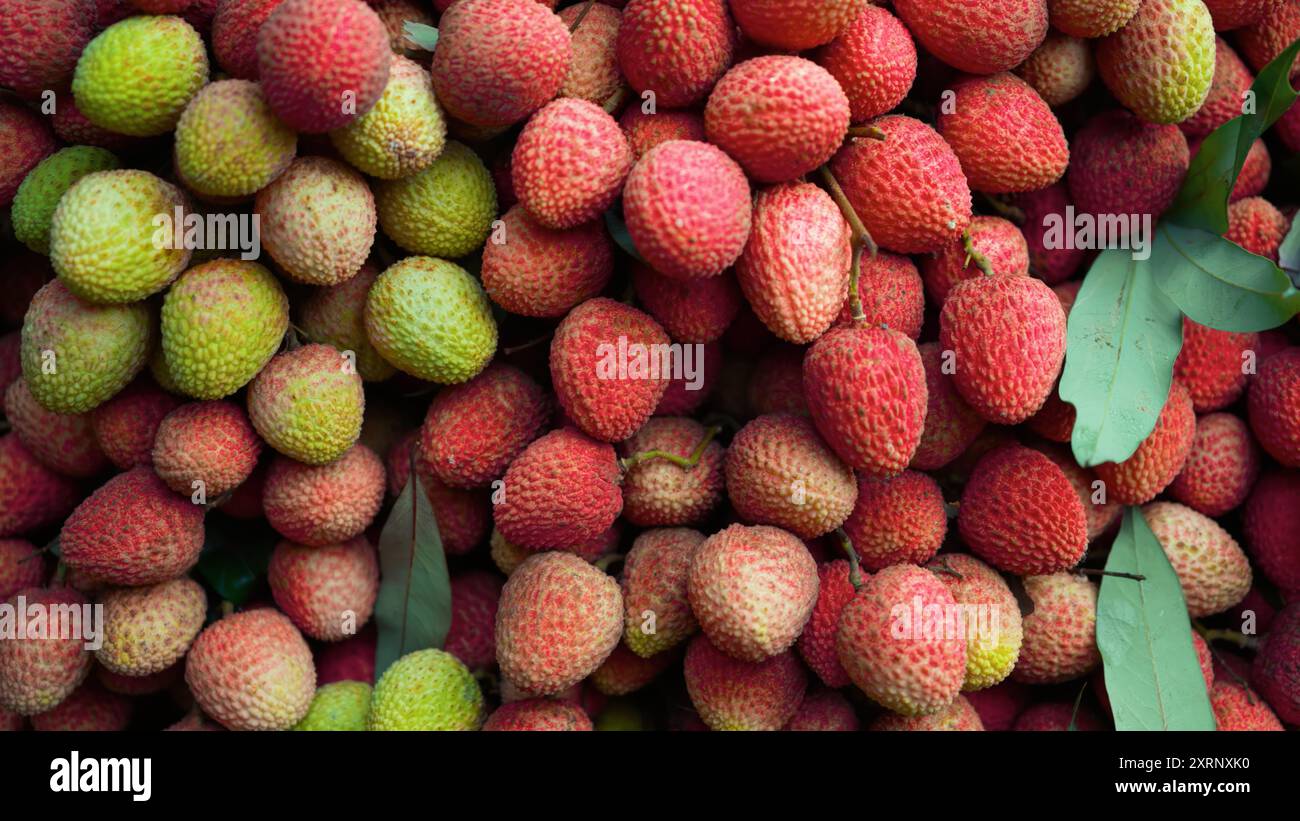 Ripe lychees, ready for sale at the market. Vibrant colors and juicy ...