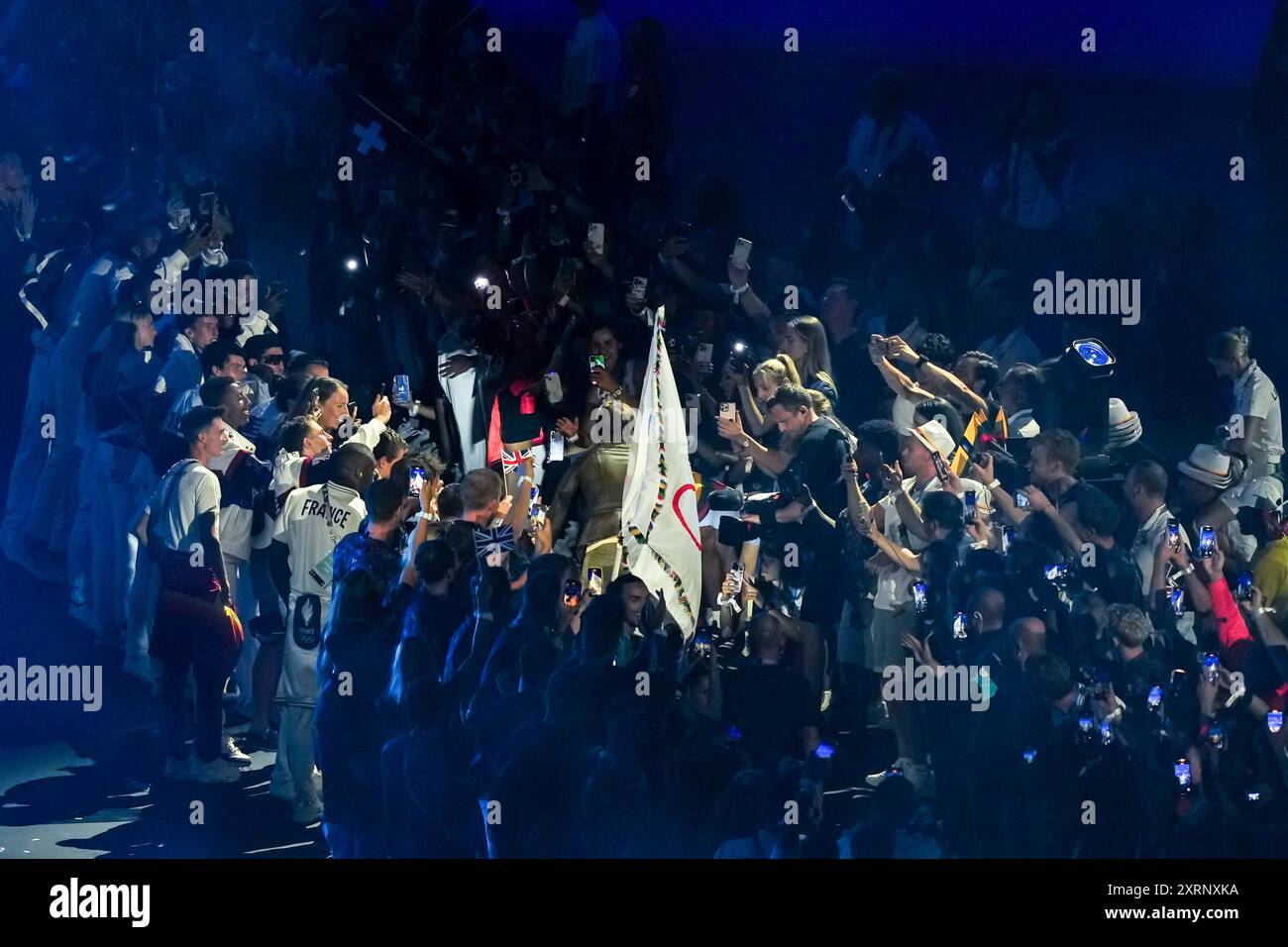 American Actor and Film Producer Tom Cruise carries the IOC Flag during ...