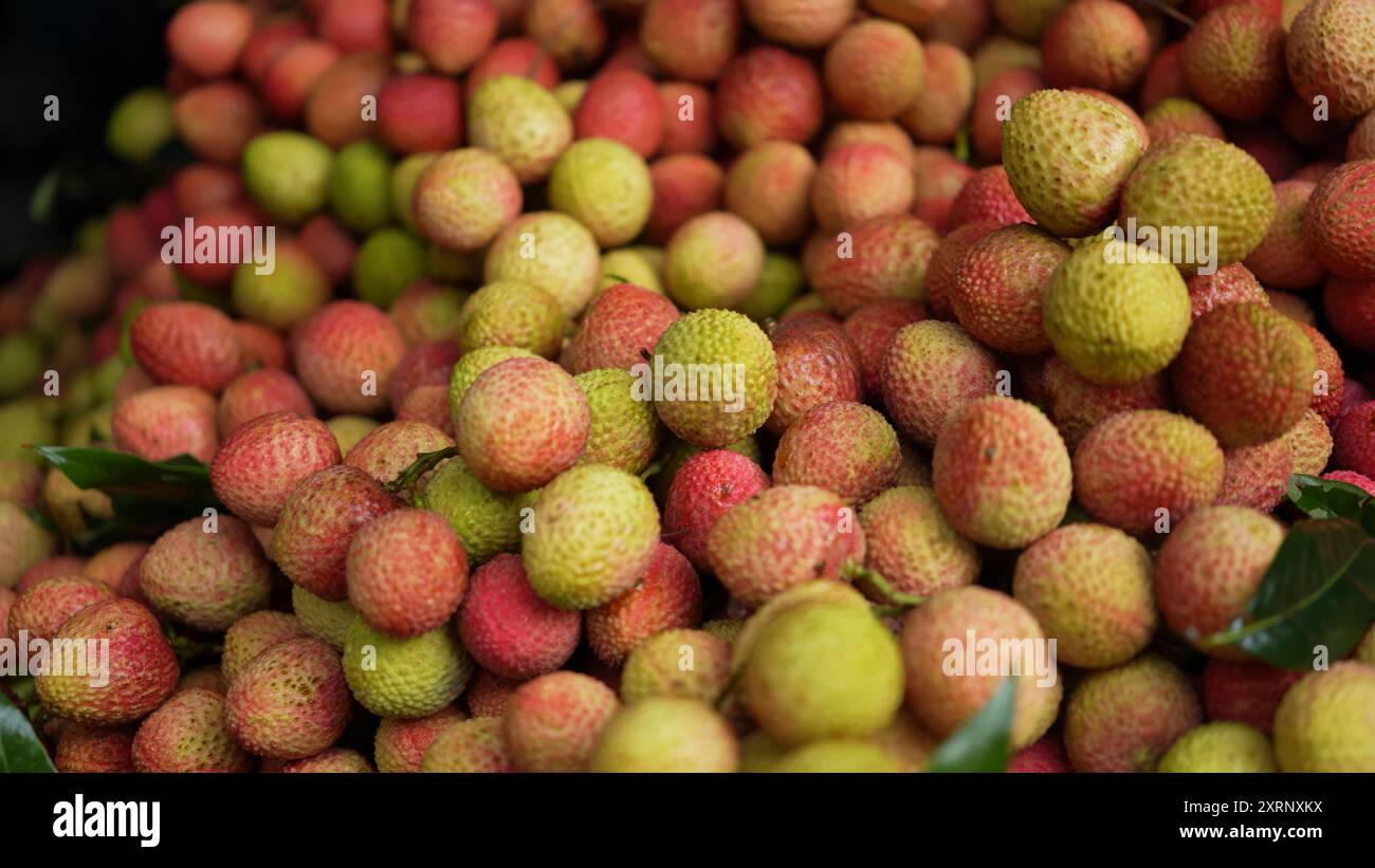 Ripe lychees, ready for sale at the market. Vibrant colors and juicy ...