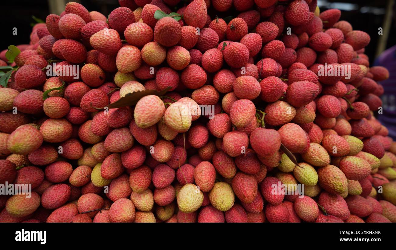 Ripe lychees, ready for sale at the market. Vibrant colors and juicy ...