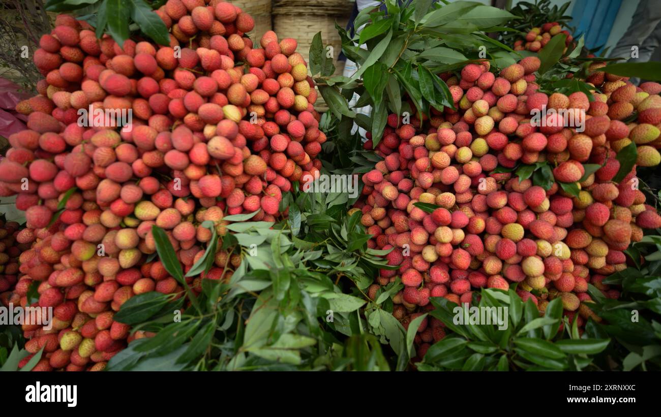 Ripe lychees, ready for sale at the market. Vibrant colors and juicy ...