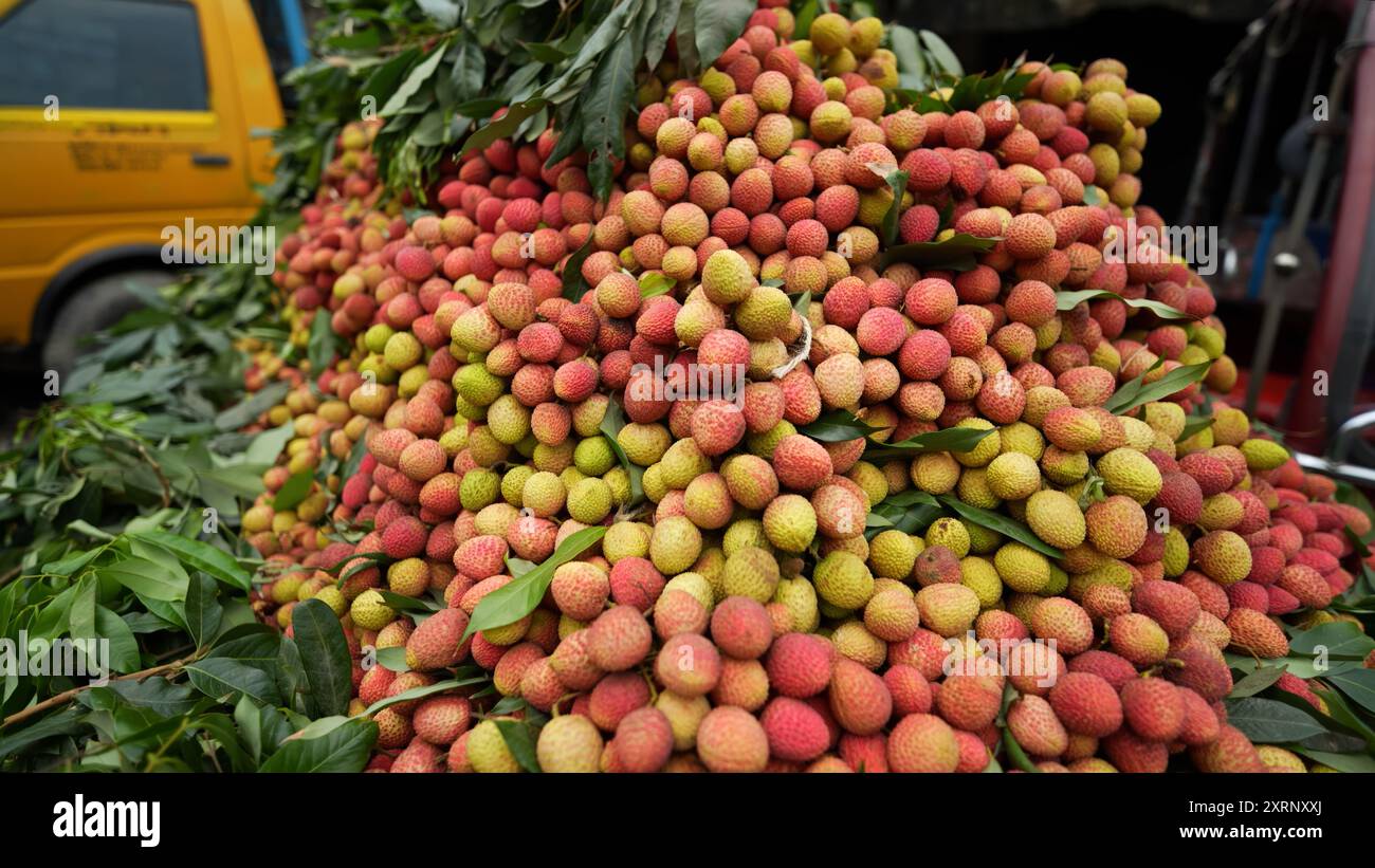Ripe lychees, ready for sale at the market. Vibrant colors and juicy ...