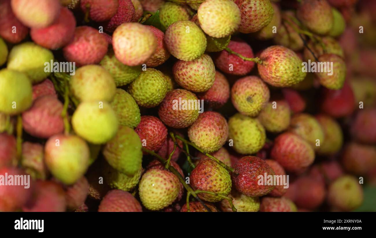 Ripe lychees, ready for sale at the market. Vibrant colors and juicy ...