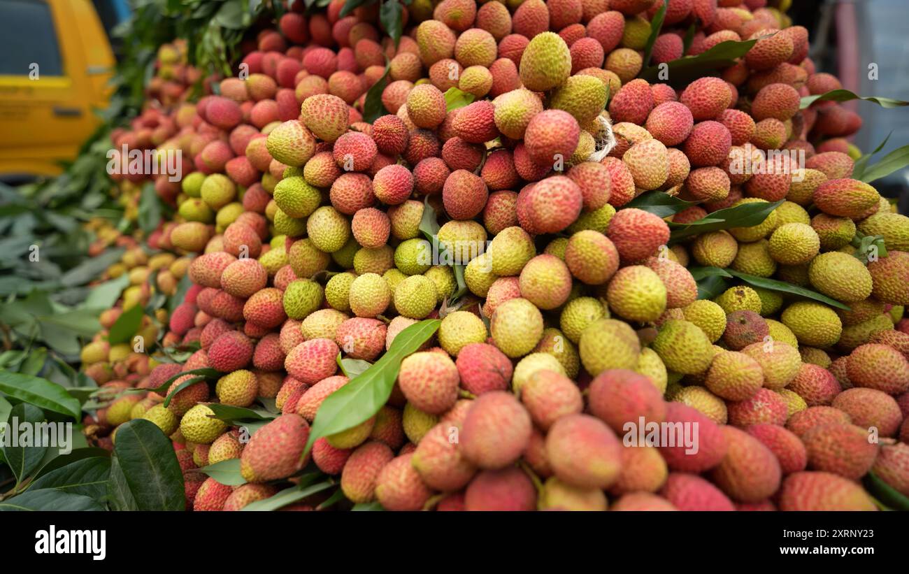 Ripe lychees, ready for sale at the market. Vibrant colors and juicy ...