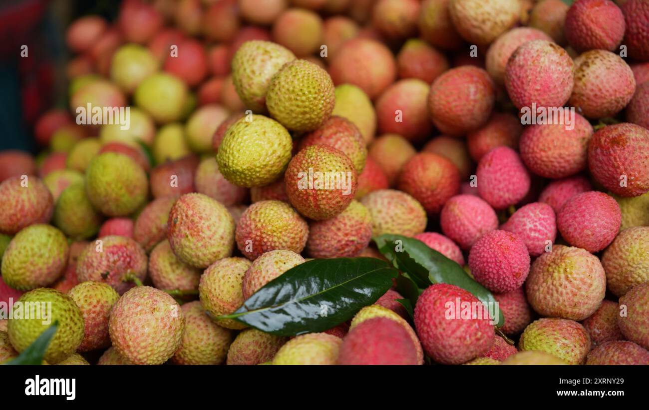 Ripe lychees, ready for sale at the market. Vibrant colors and juicy ...