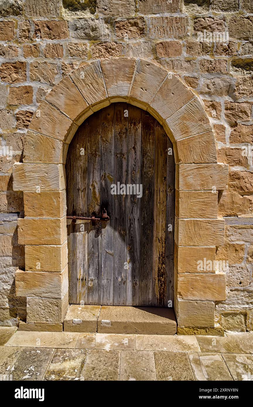Old entrance door to one of the barrack rooms along the inner wall of ...