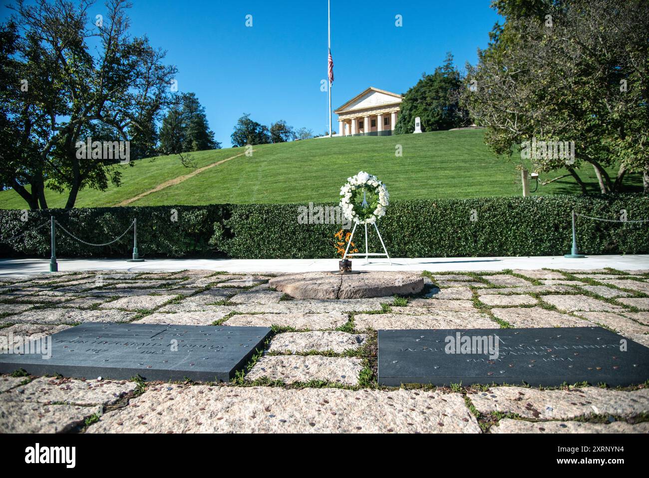 President John F Kennedy gravesite in Arlington Cemetery with Robert E Lee's home in the ...