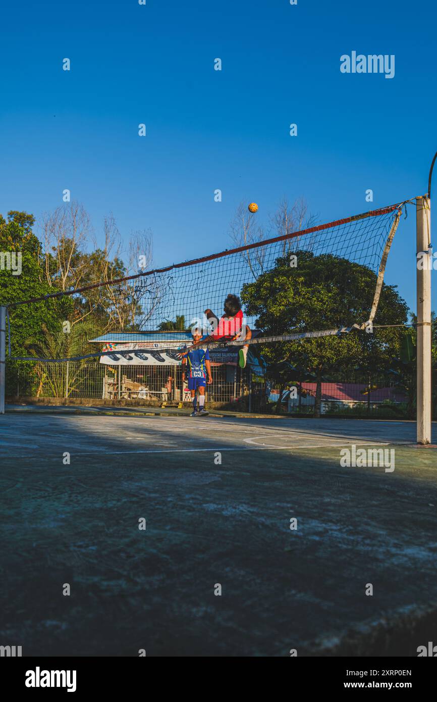 Balikpapan, Indonesia - August 1st, 2024. The player jumps with an ...