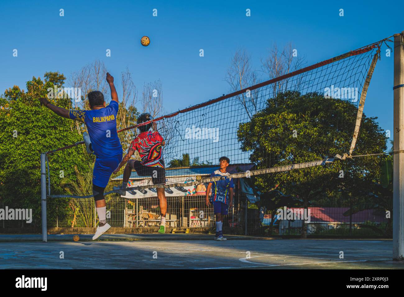Balikpapan, Indonesia - August 1st, 2024. the opponent jumps to block ...