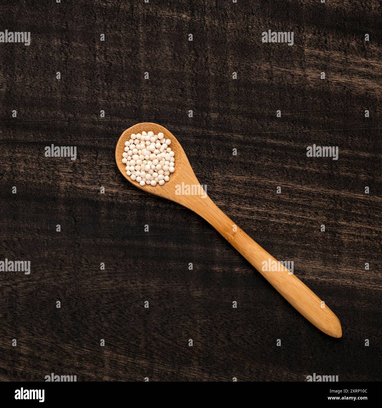 Starch tapioca pearls on the spoon - Manihot esculenta Stock Photo - Alamy