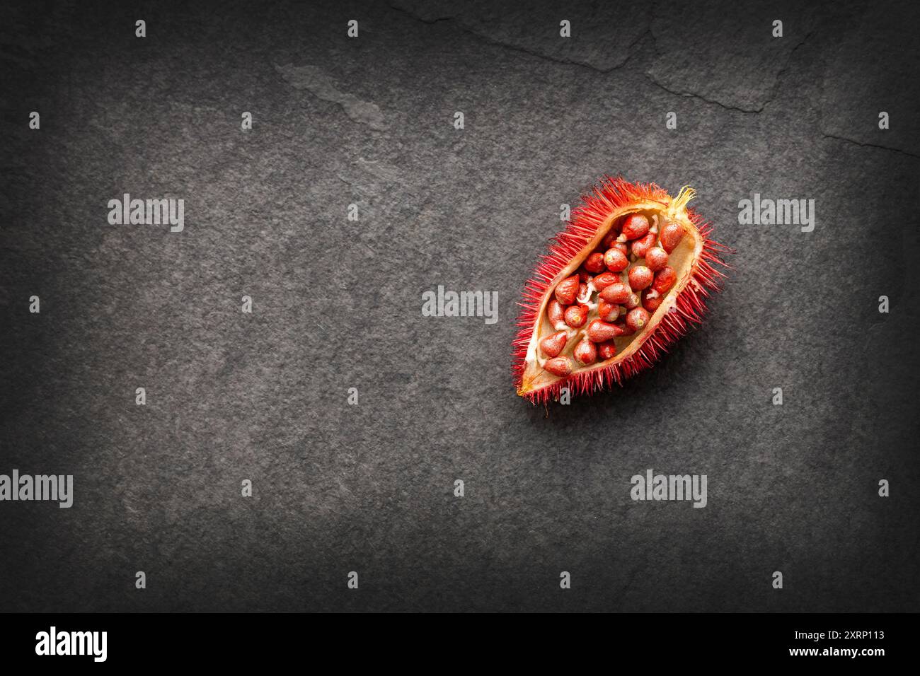 Organic red annatto seeds - Bixa Orellana Stock Photo - Alamy