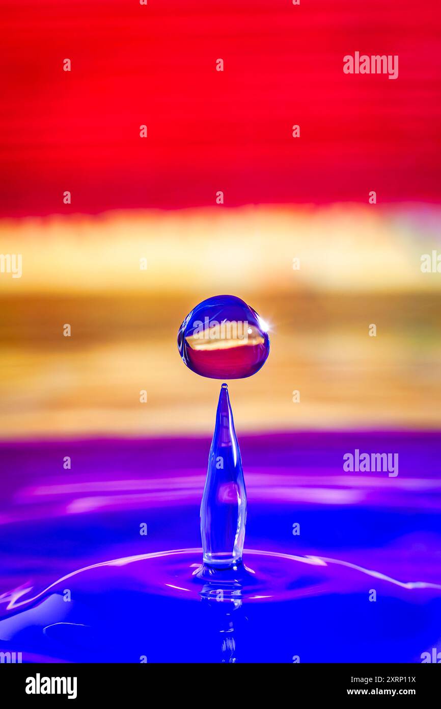 Water droplet rebound Stock Photo - Alamy