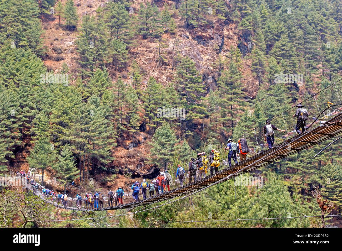 Crowded suspension bridge on the Everest Base Camp trek Stock Photo - Alamy