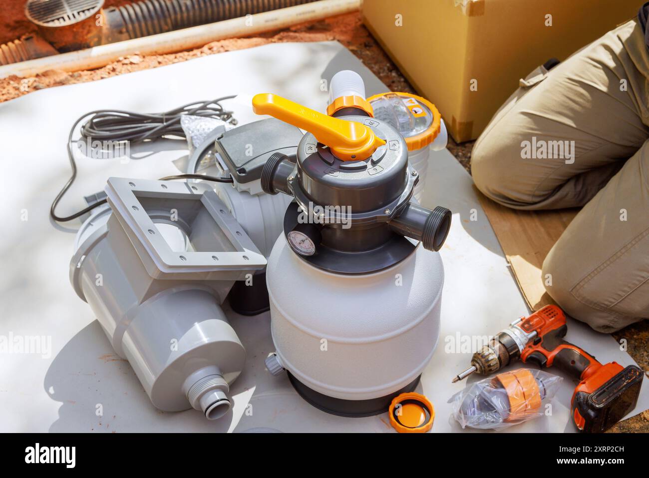 Installing sand filter system tank, equipment for swimming pool ...