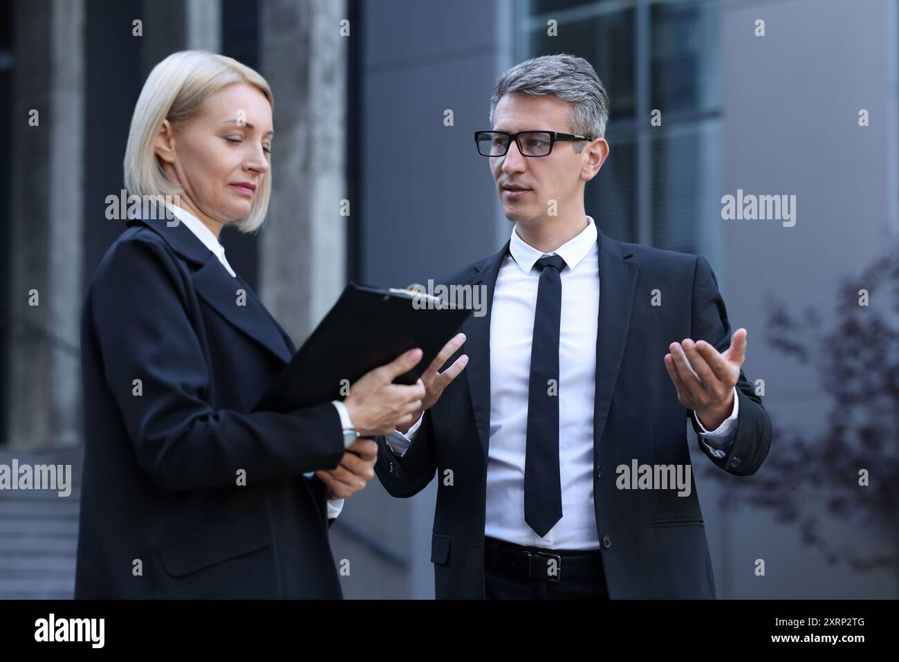 International relations. Diplomats talking during meeting outdoors ...