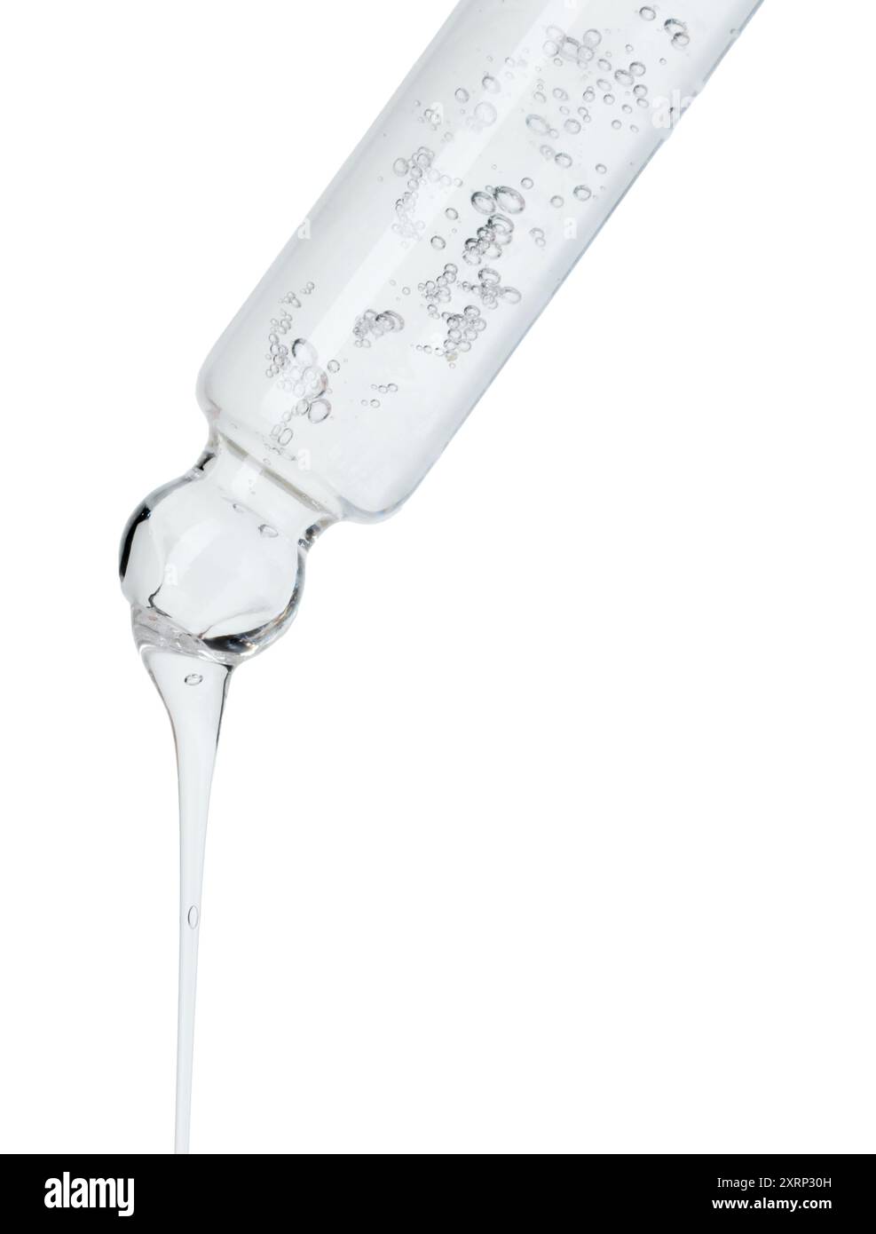 Dripping cosmetic serum from pipette on white background Stock Photo ...
