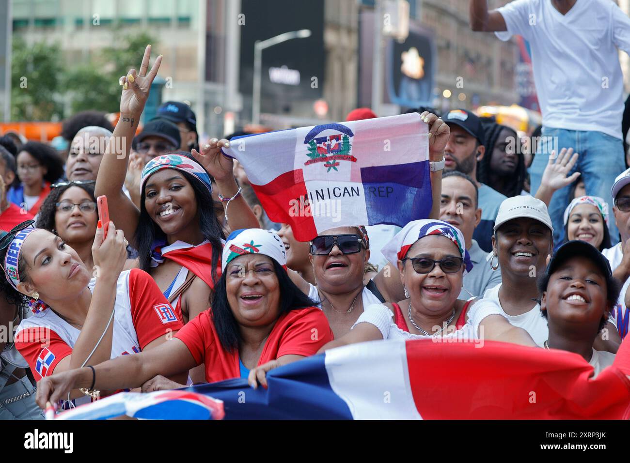 New York, USA, August 11, 2024 - A vibrant crowd of spectators proudly ...