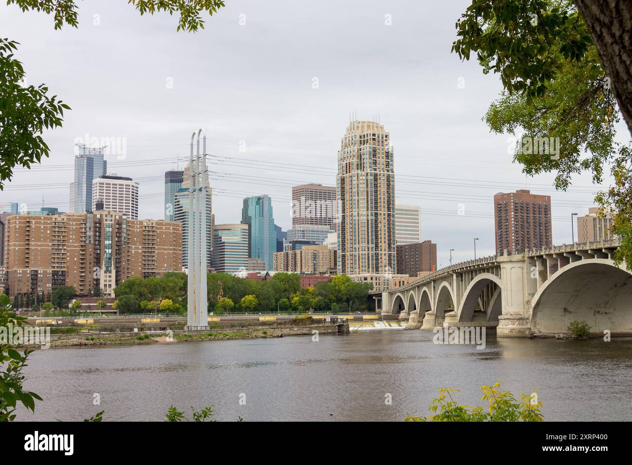 The third avenue bridge over the Mississipi river and the skyline with ...