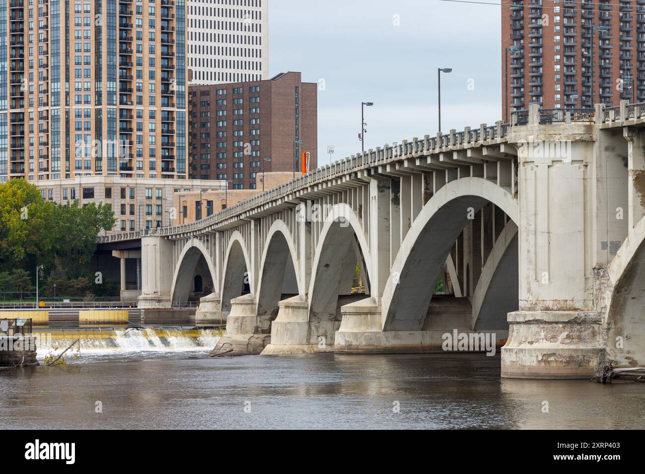 The third avenue bridge over the Mississipi river and the skyline with ...