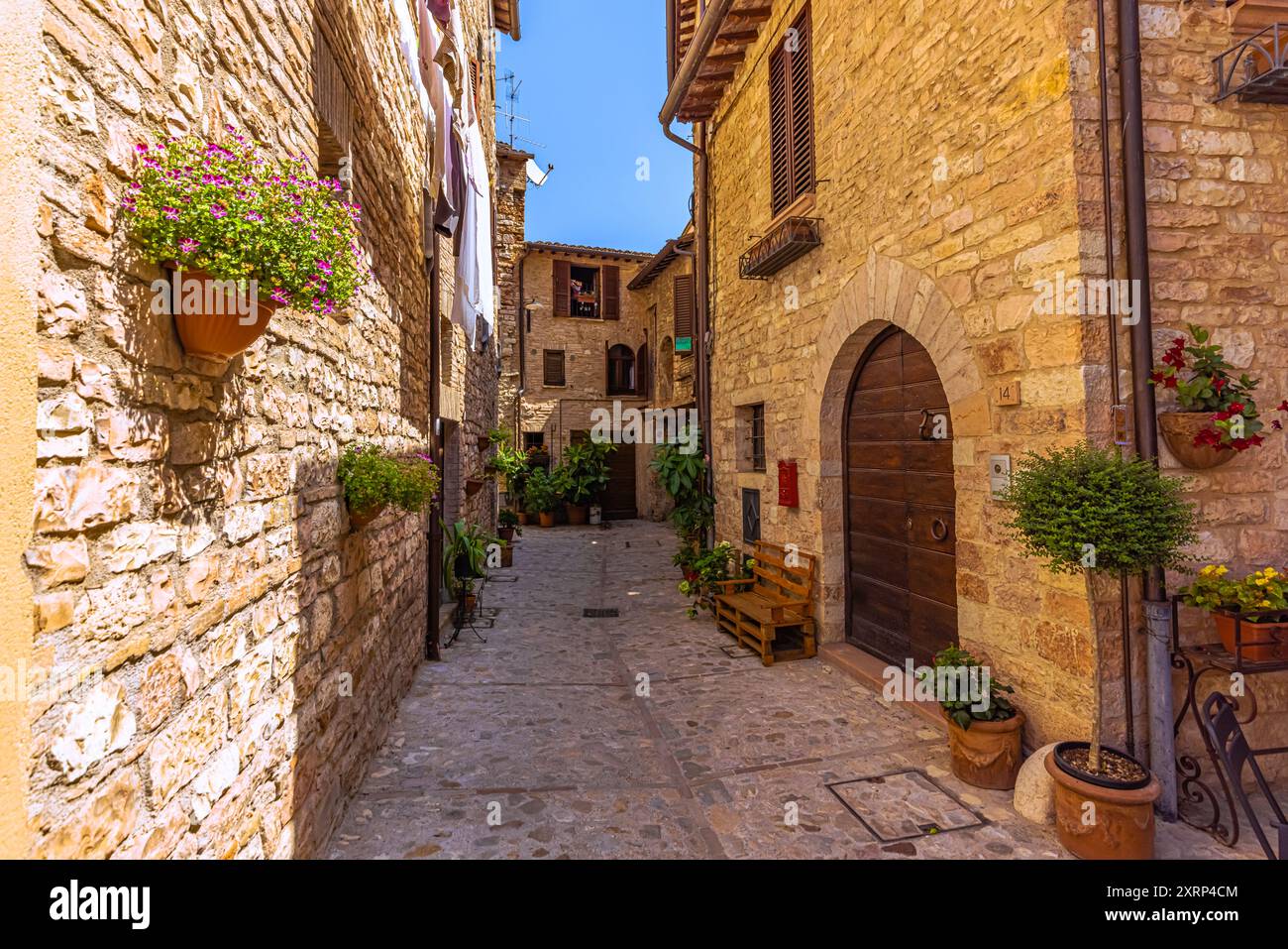 Street view of the medieval town of Spello in Umbria, Italy Stock Photo ...