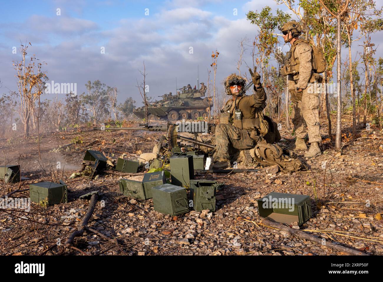 U.S. Marine Corps Cpl. Mike Munoz, front, a team leader with Weapons ...