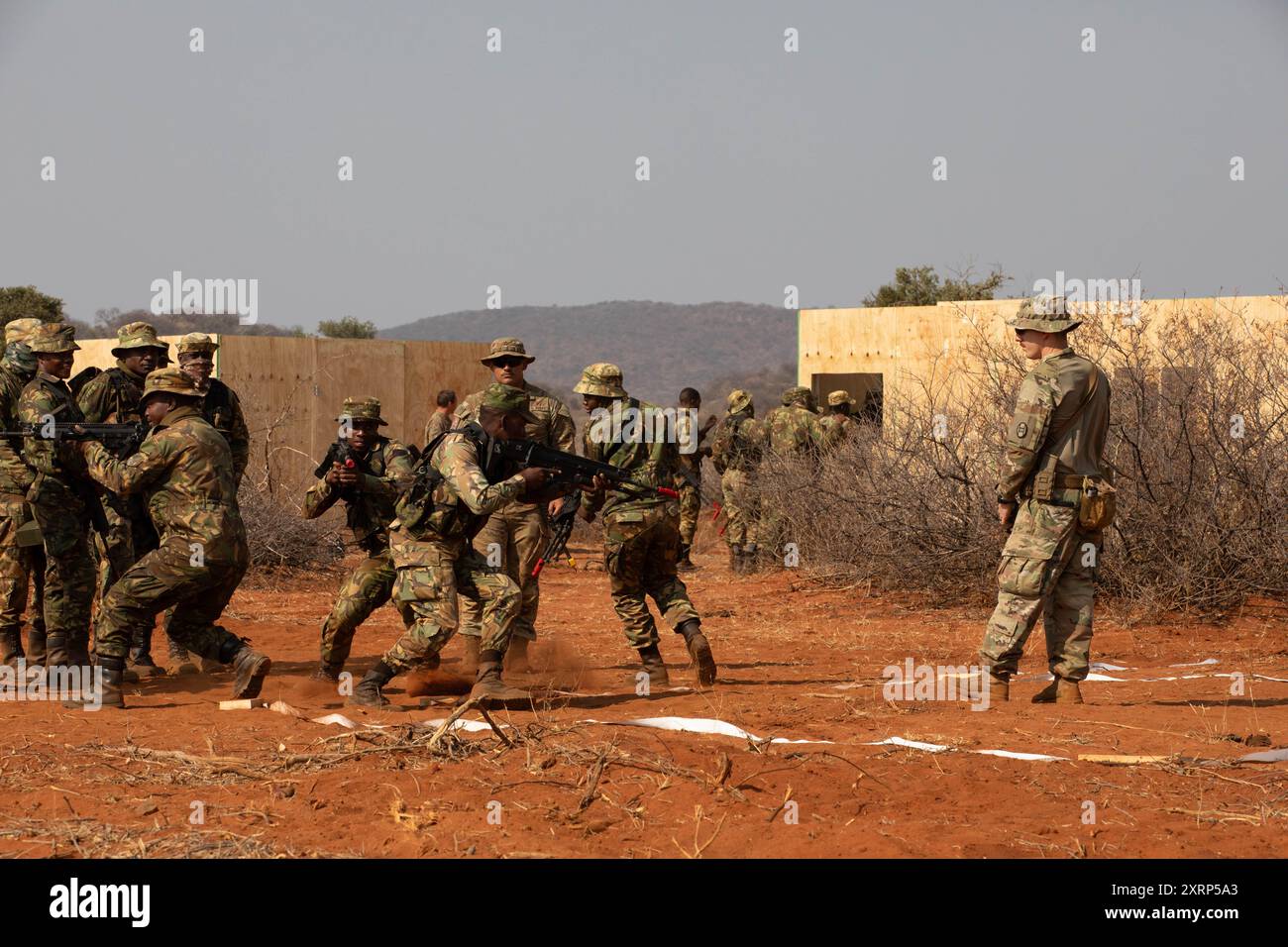 Soldiers with the Botswana Defence Force practice entering a building ...
