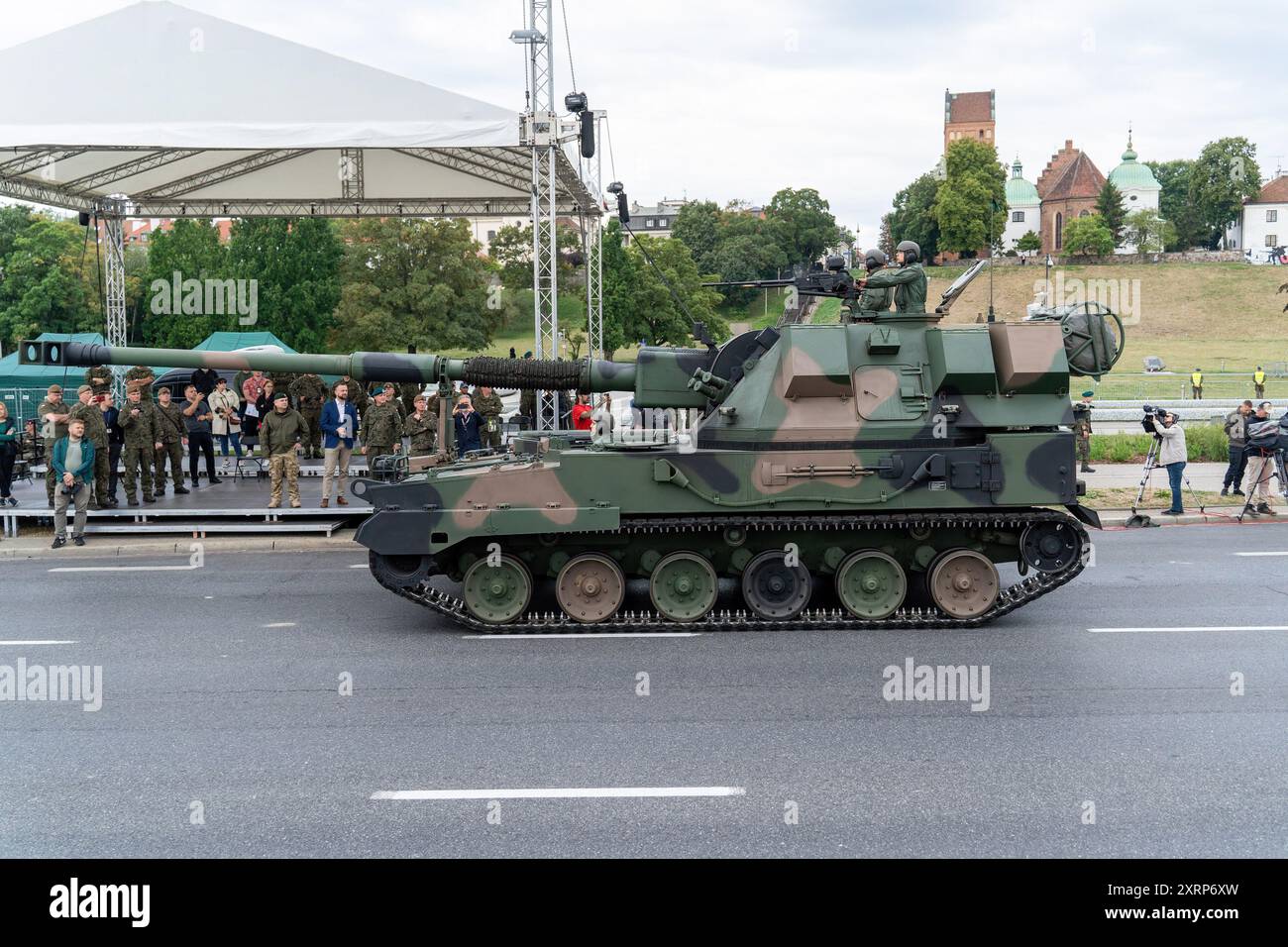 Krab passes by during the general rehearsal, with a soldier saluting ...