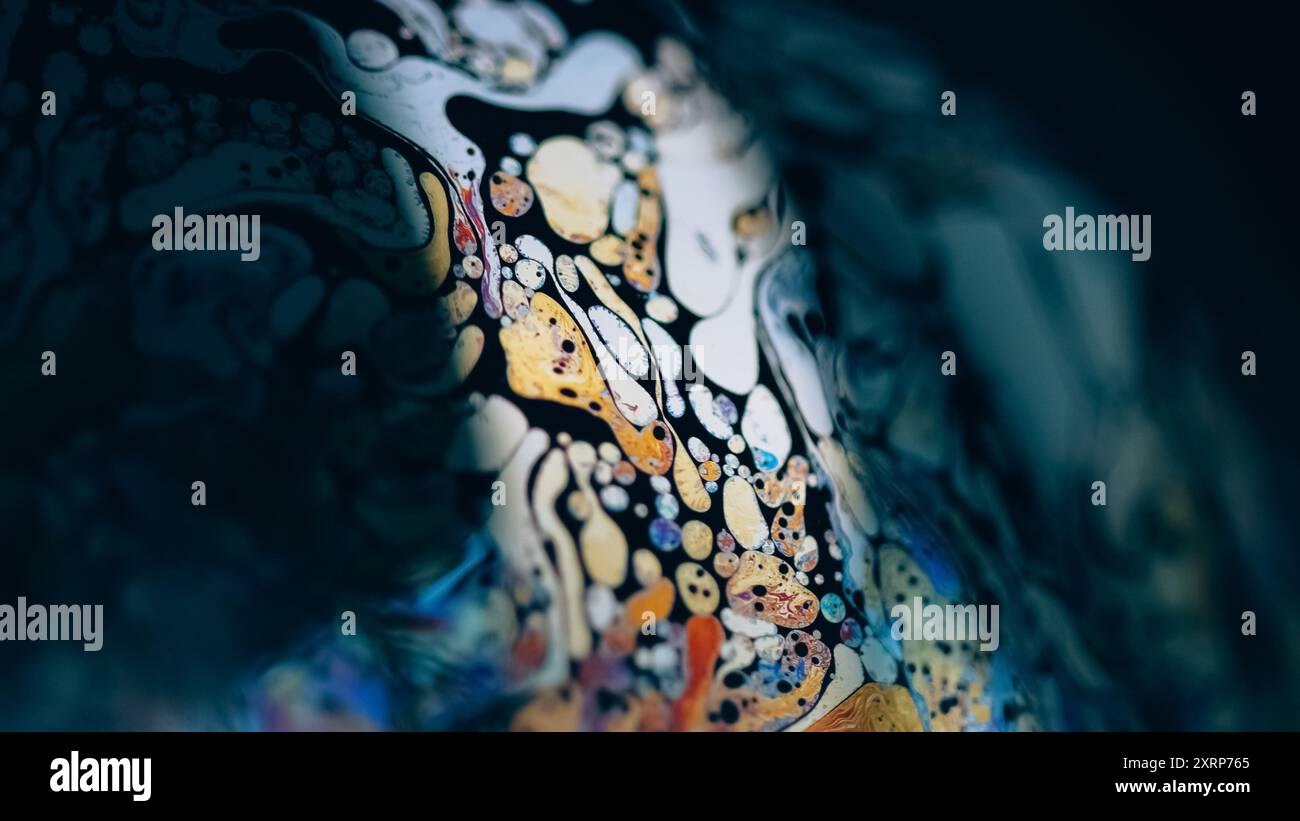 Acid ink. Bubble liquid. Defocused blue yellow color fizzy texture ...