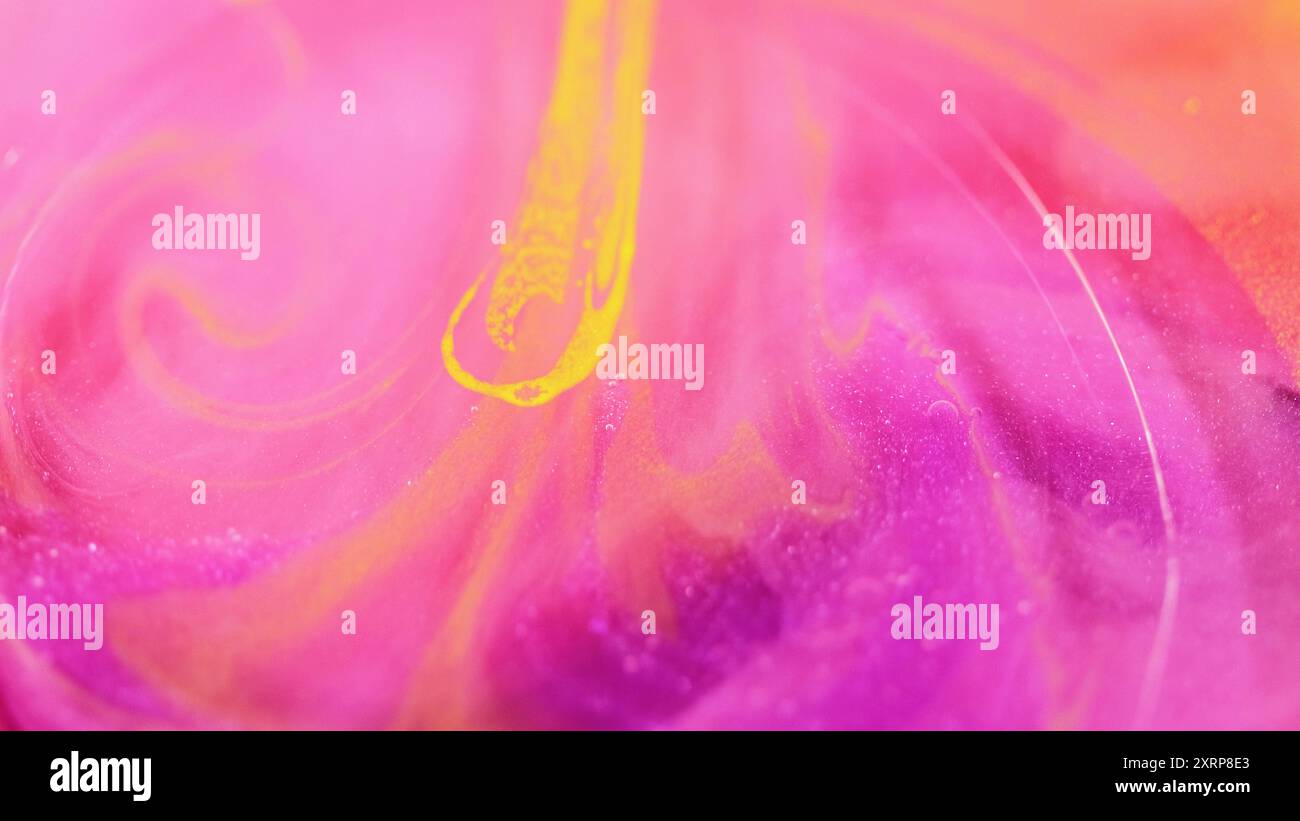 Shimmer ink. Glitter liquid. Defocused pink yellow color gleaming ...