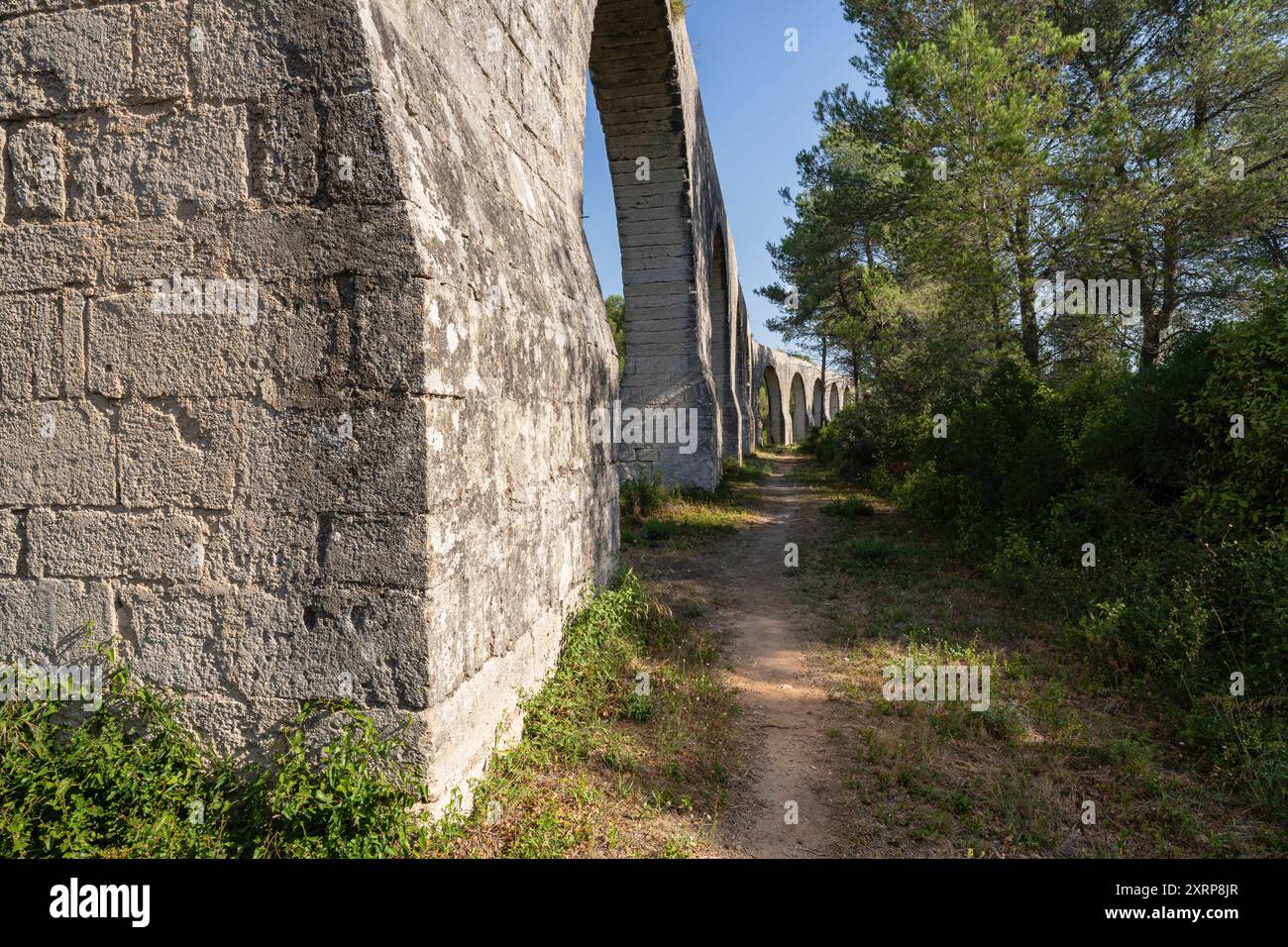 Summer landscape view of ancient stone aqueduct, famous historic ...