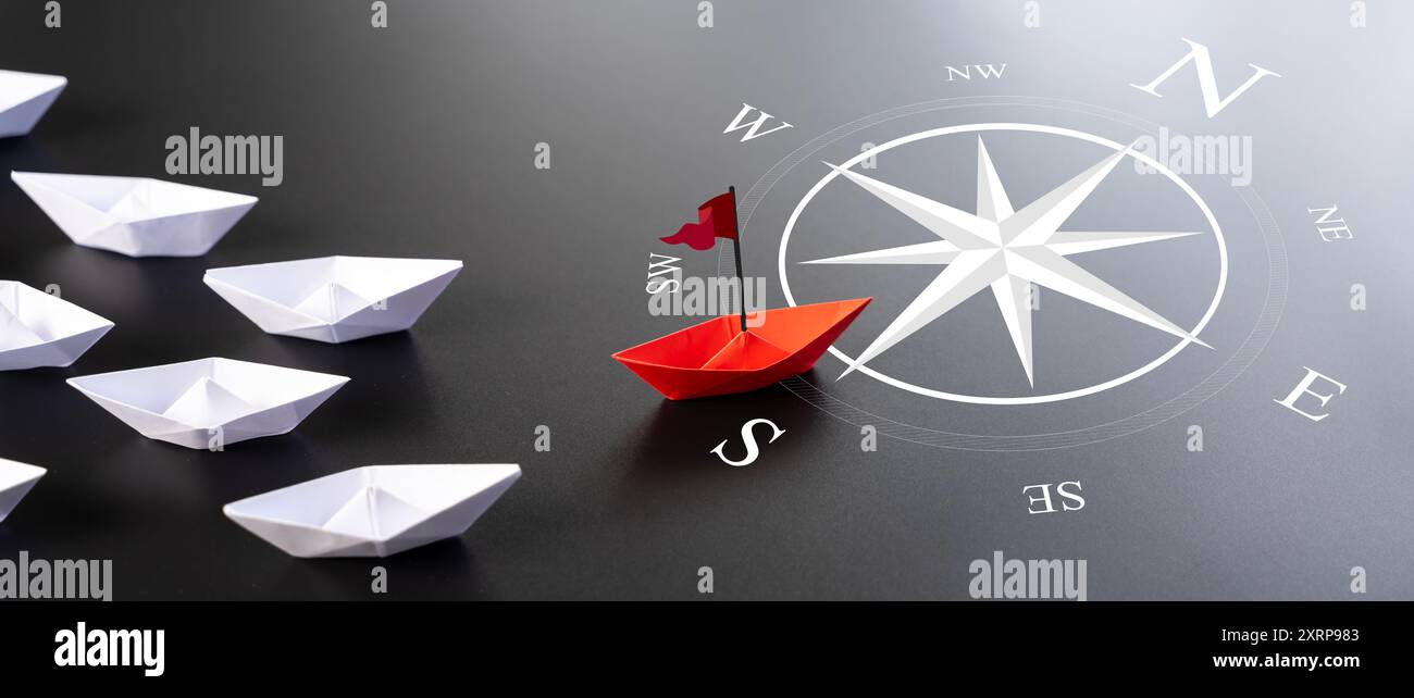Red Paper Boat On Compass Leading A Fleet Of Small White Boats ...