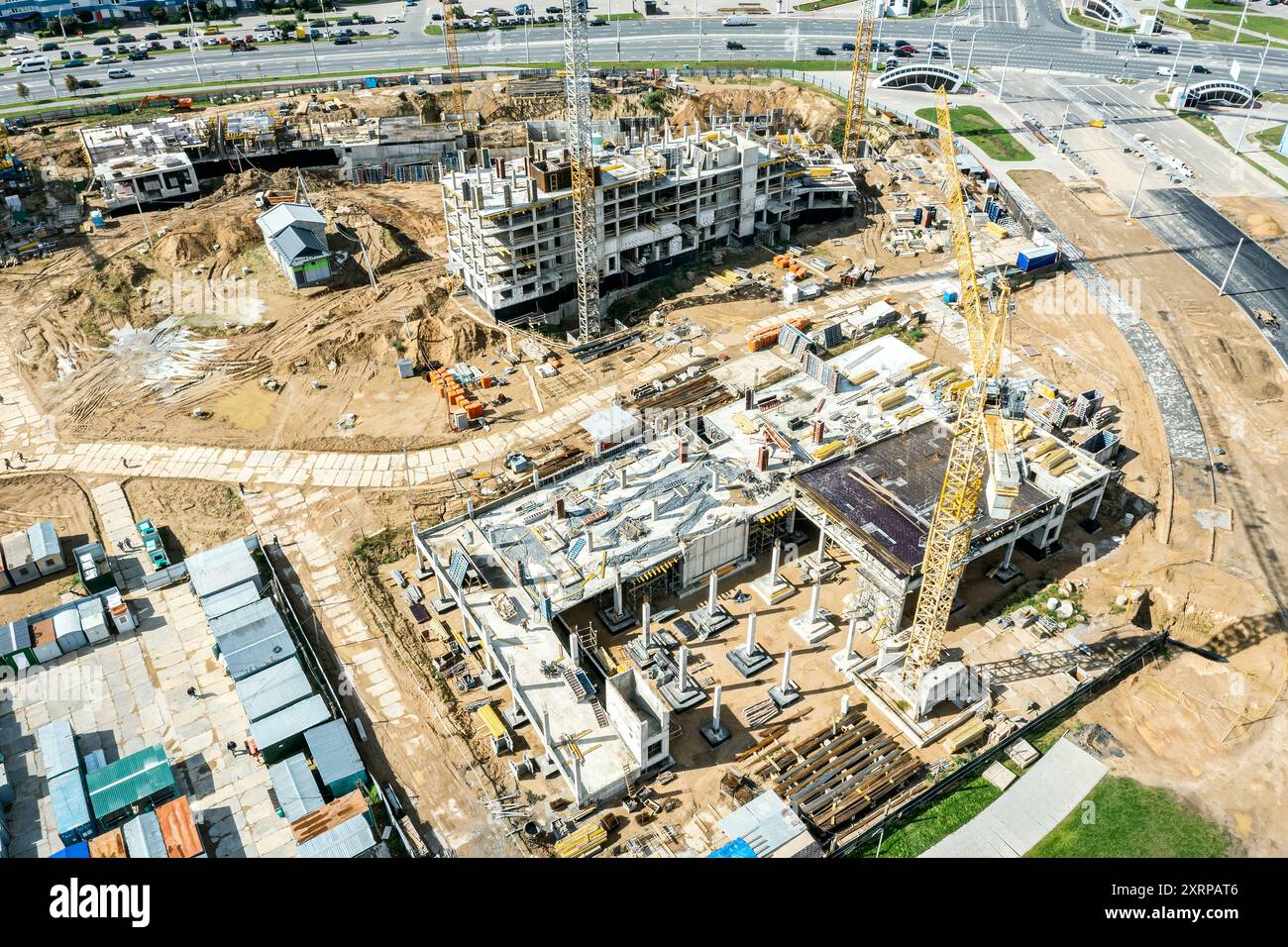construction of new apartment buildings and multilevel parking garage ...