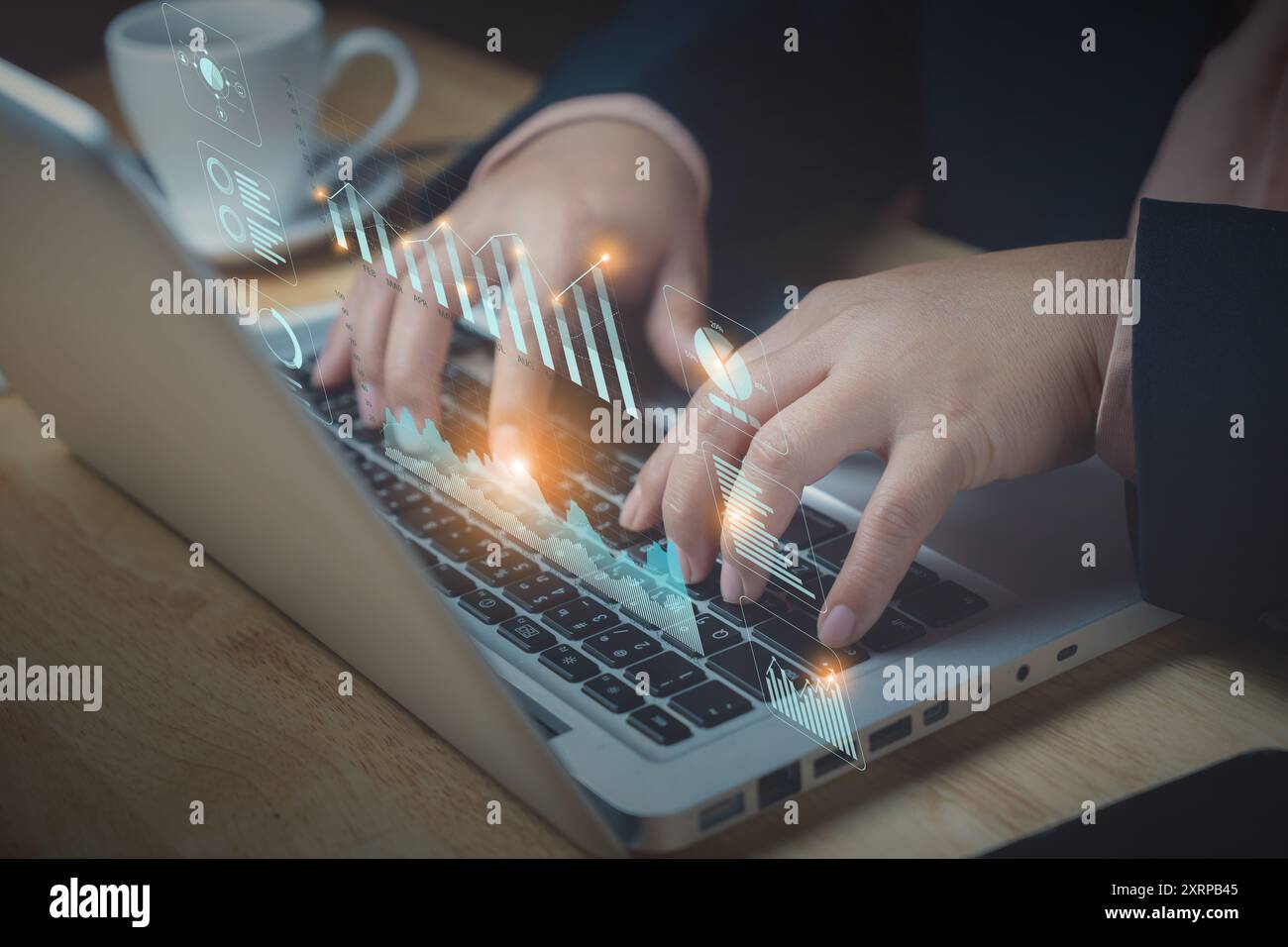 Tablet, hologram chart, and business people in the office with laptops ...